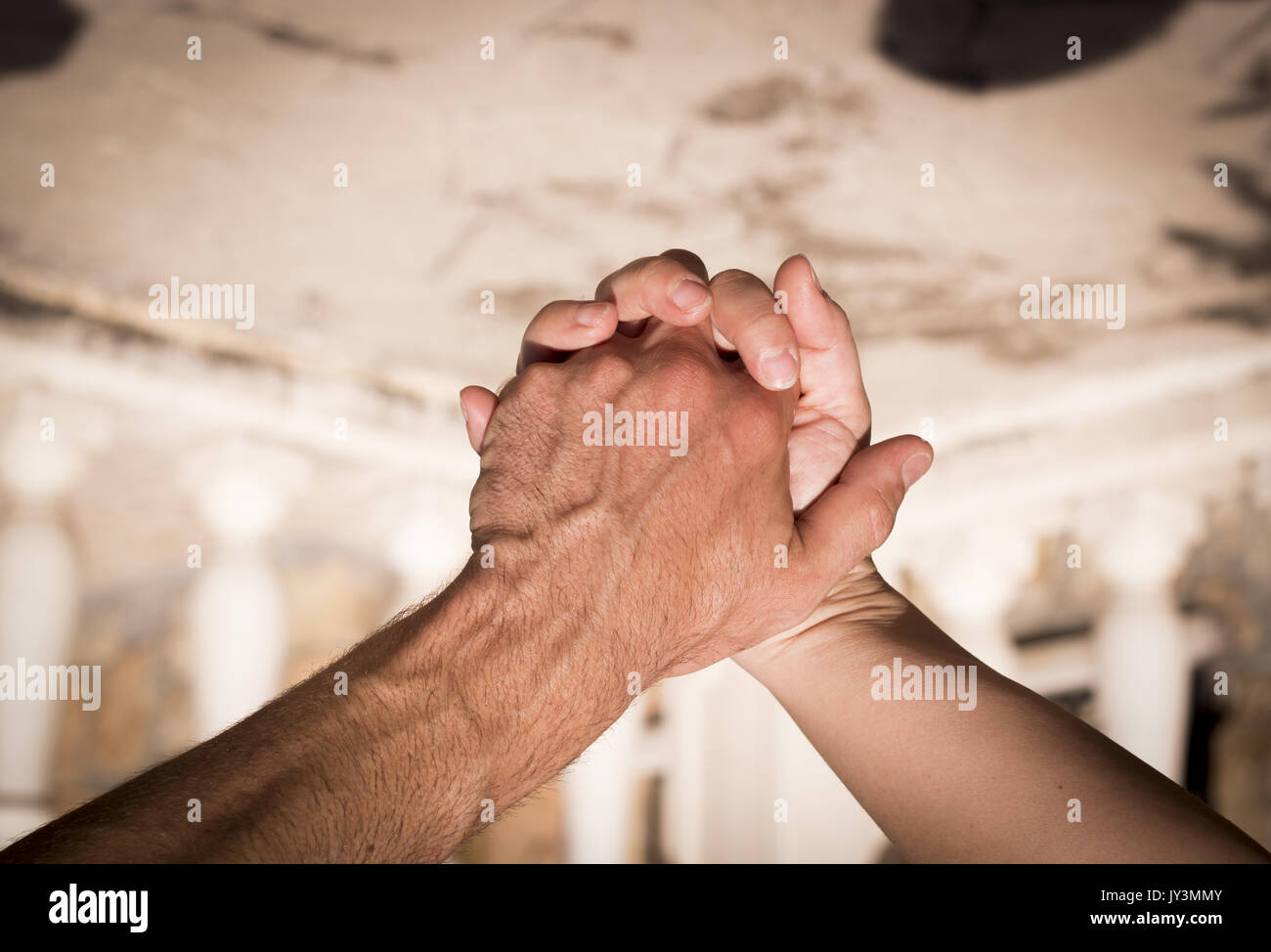 Hands of two lovers intertwined Stock Photo - Alamy