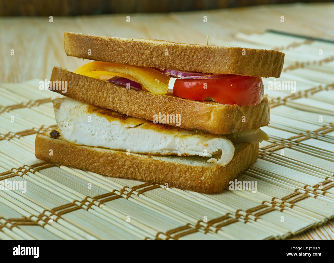 Smoked Paprika Fried Chicken Club Sandwich. close up meal Stock Photo ...