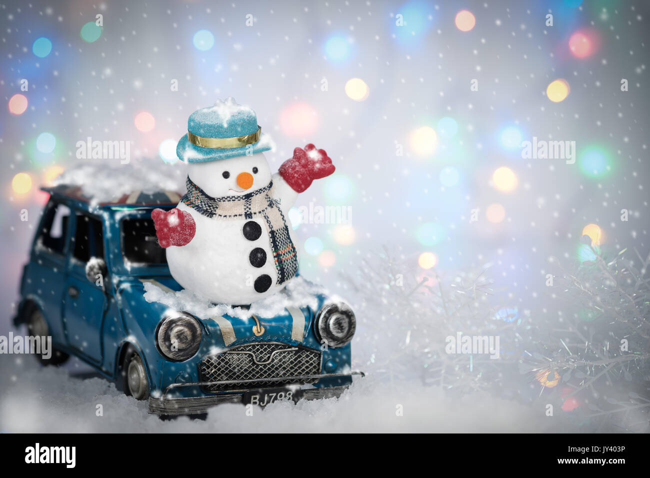 Snowman and mini car in the snowfall background, AF point selection and ...