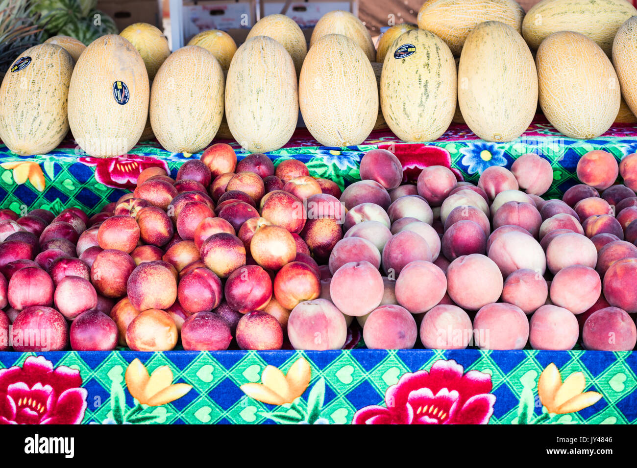 Beautiful display of fresh fruit, melons, nectarines at a Farmers ...