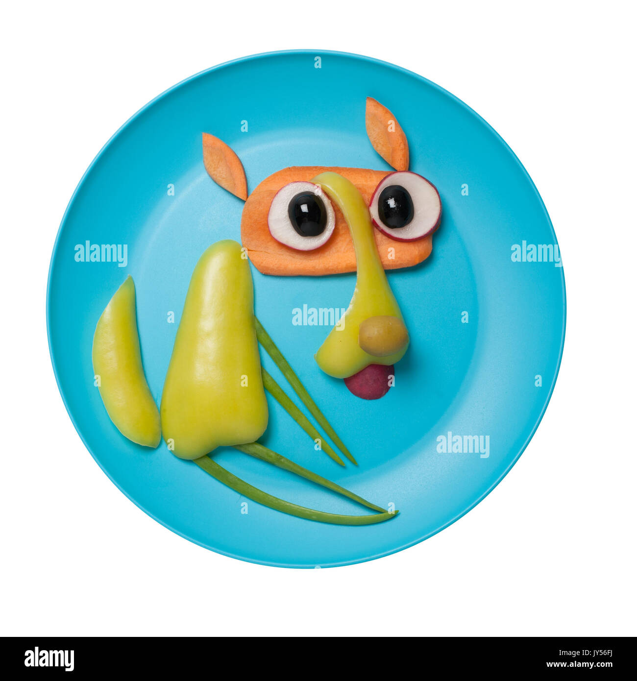 Funny sitting wolf compiled of vegetables on plate Stock Photo - Alamy