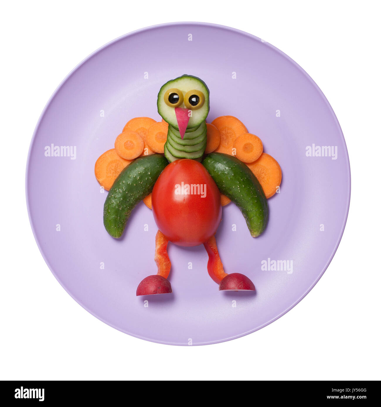 Funny vegetable peacock compiled on pink plate Stock Photo - Alamy
