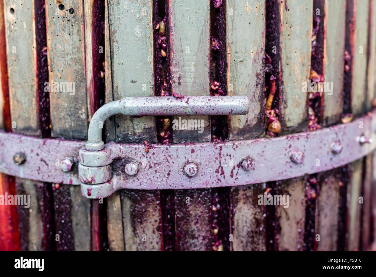 Detail of wooden wine press for pressing grapes to produce wine ...