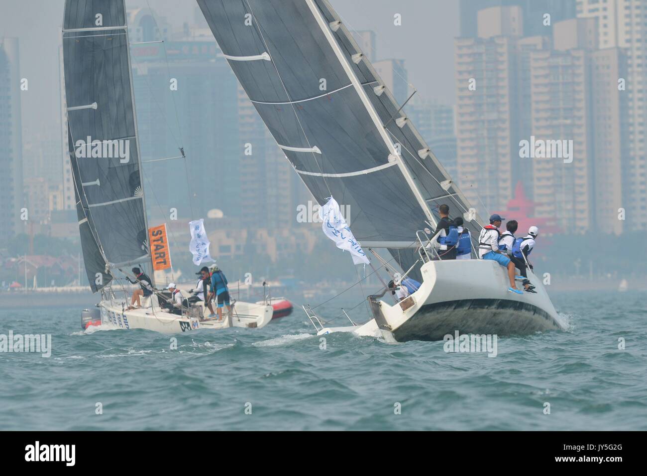 Qingdao, China. 18th August, 2017. The sailing contest is held at ...