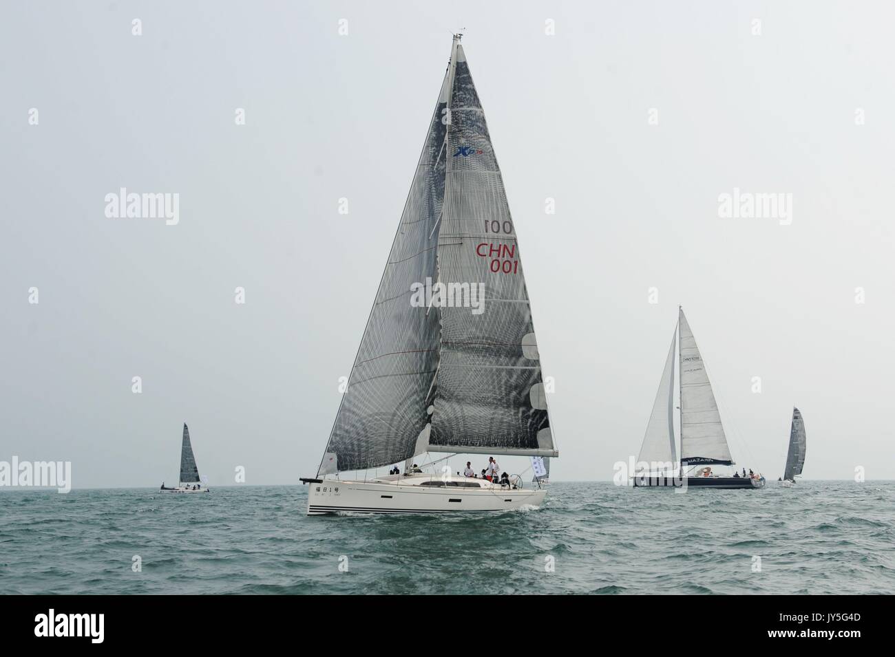 Qingdao, China. 18th August, 2017. The sailing contest is held at ...