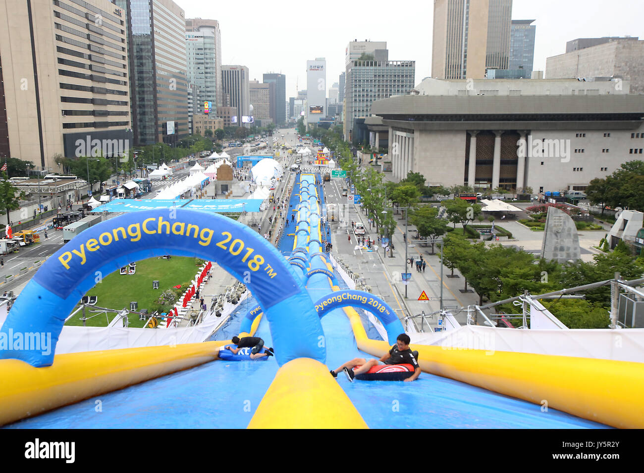 Water bobsleigh South Korean citizens enjoy a water slide set up at ...