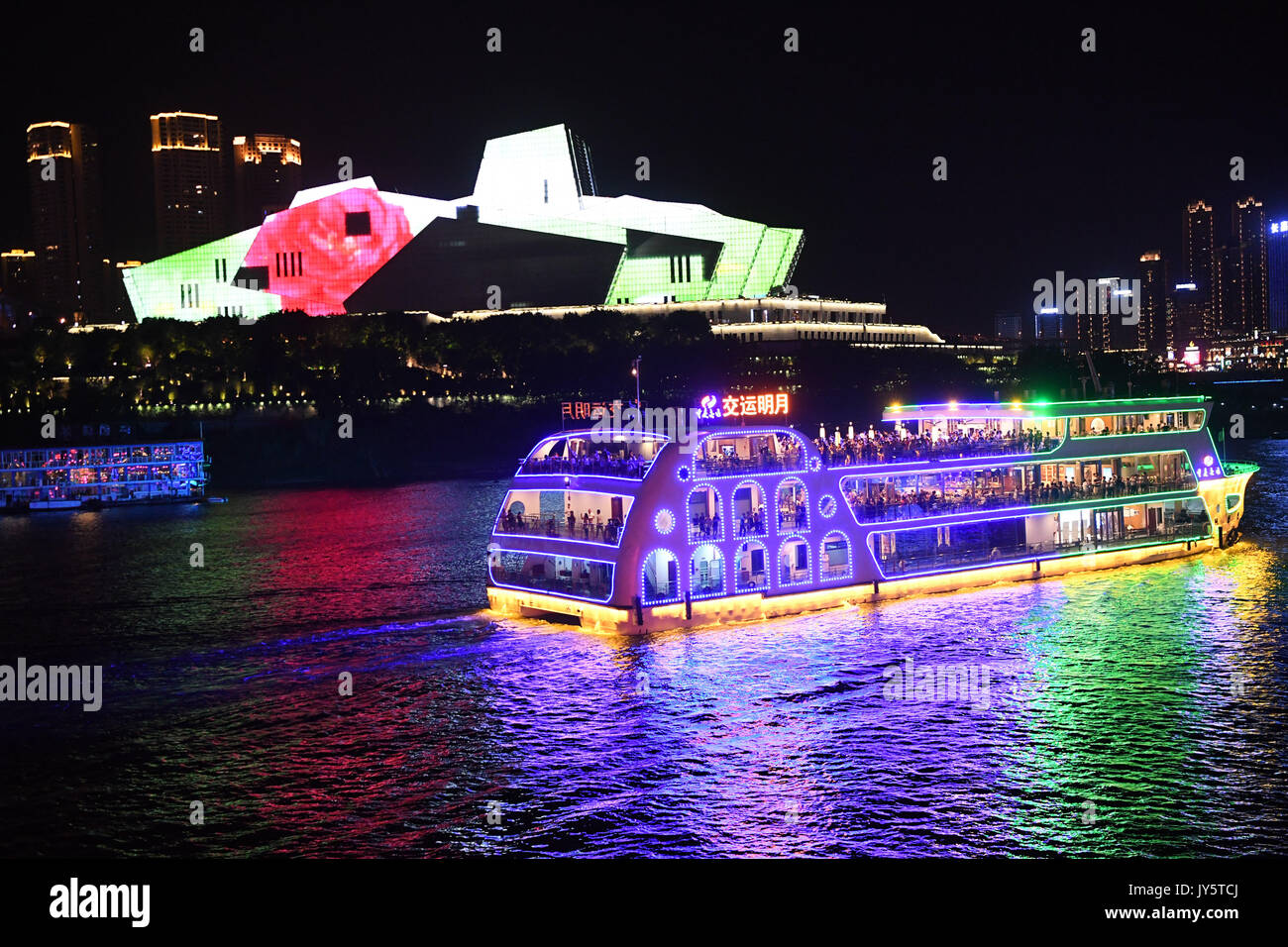 Chongqing. 18th Aug, 2017. Tourists take a sightseeing boat to view ...