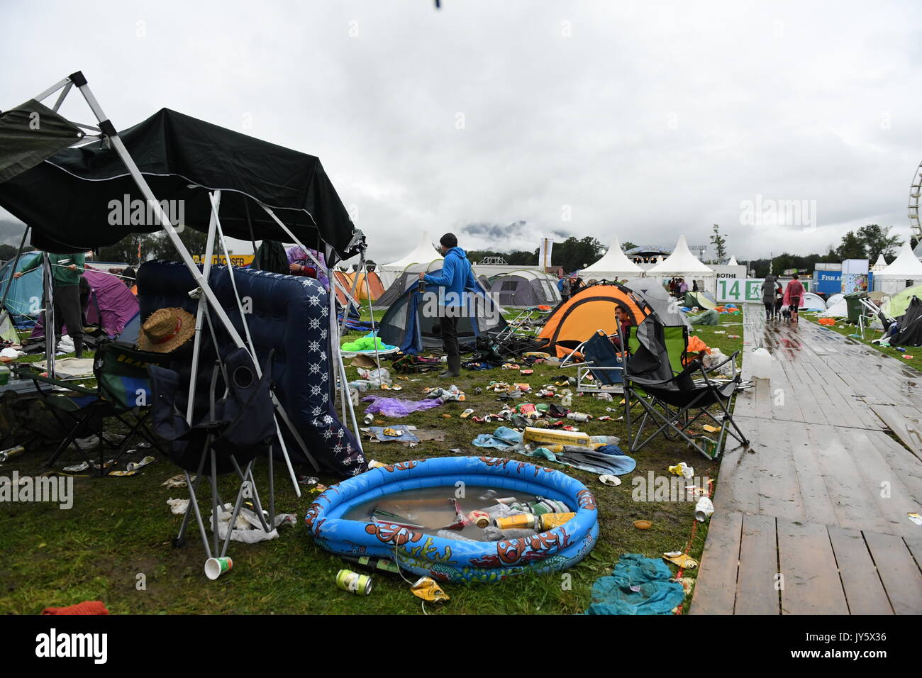 Uebersee, Germany. 18th Aug, 2017. Damaged tents and belongigns of ...