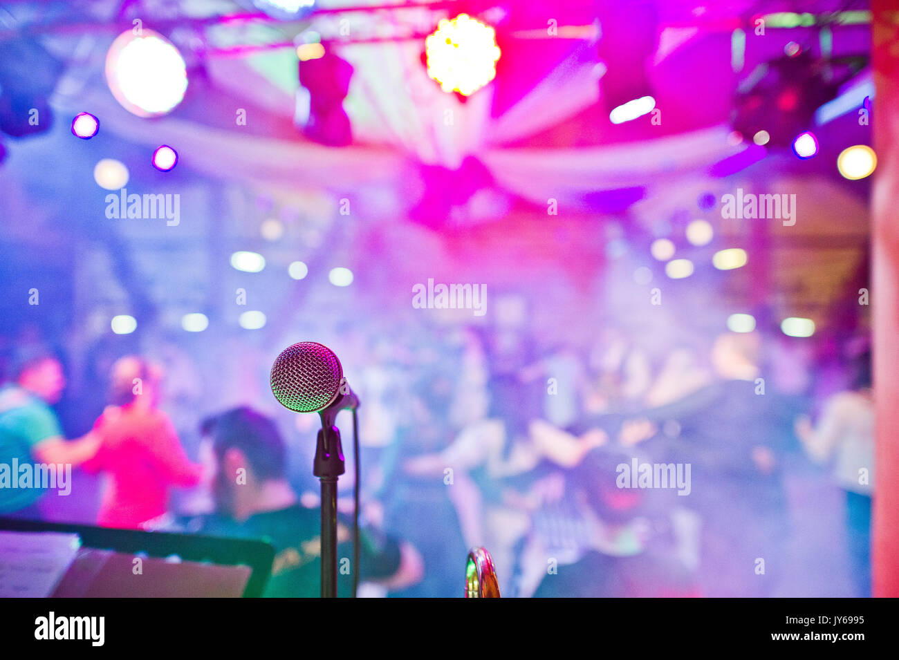 Close-up photo of a microphone in the night club Stock Photo - Alamy