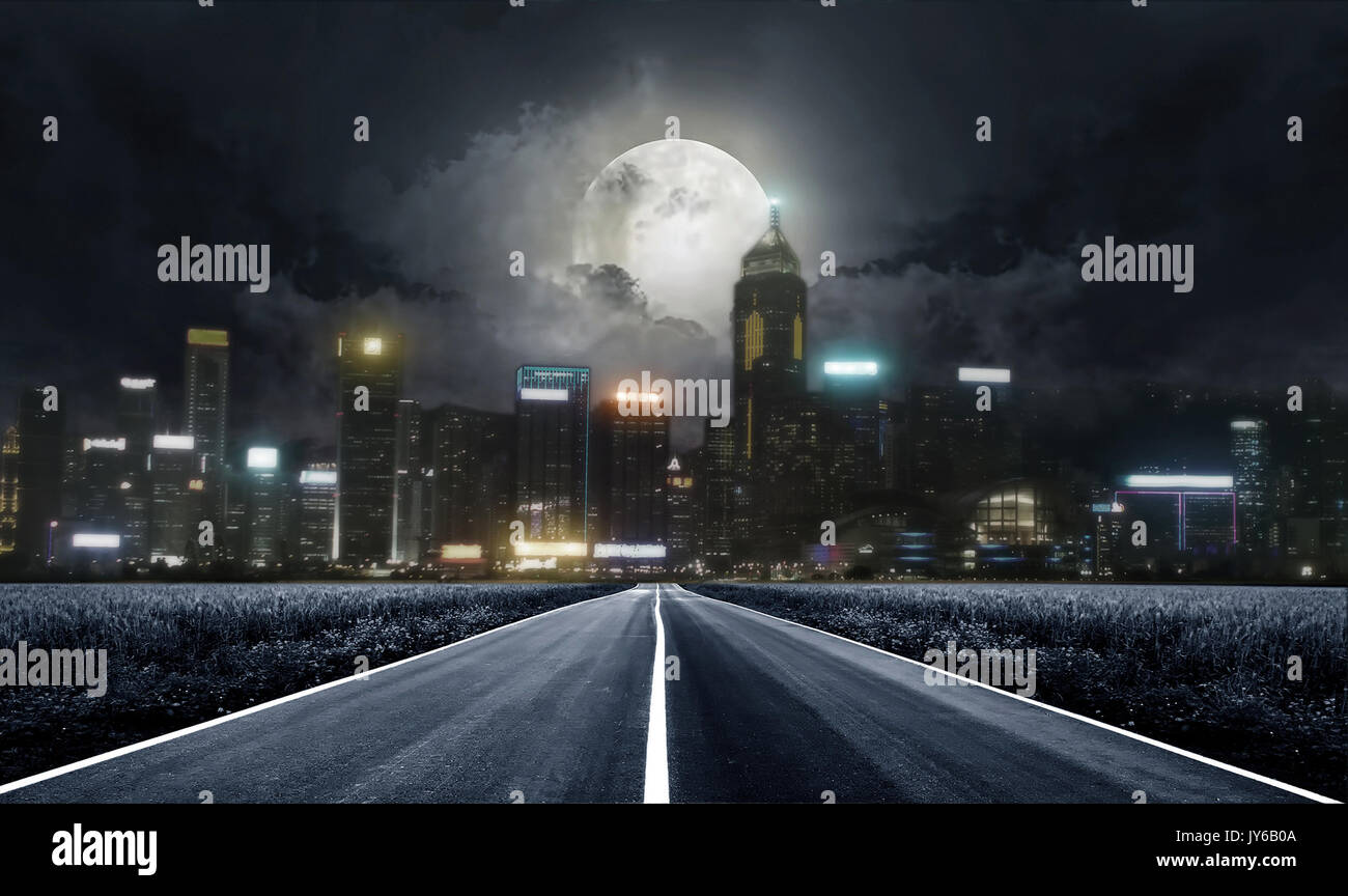 country road at night with large moon Stock Photo - Alamy