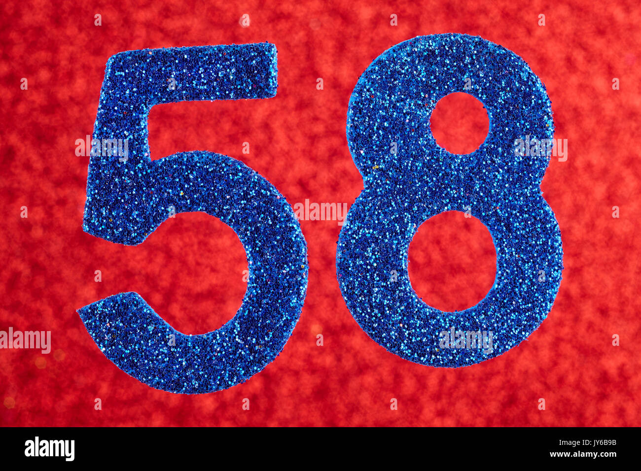 Number fifty-eight blue color over a red background. Anniversary ...