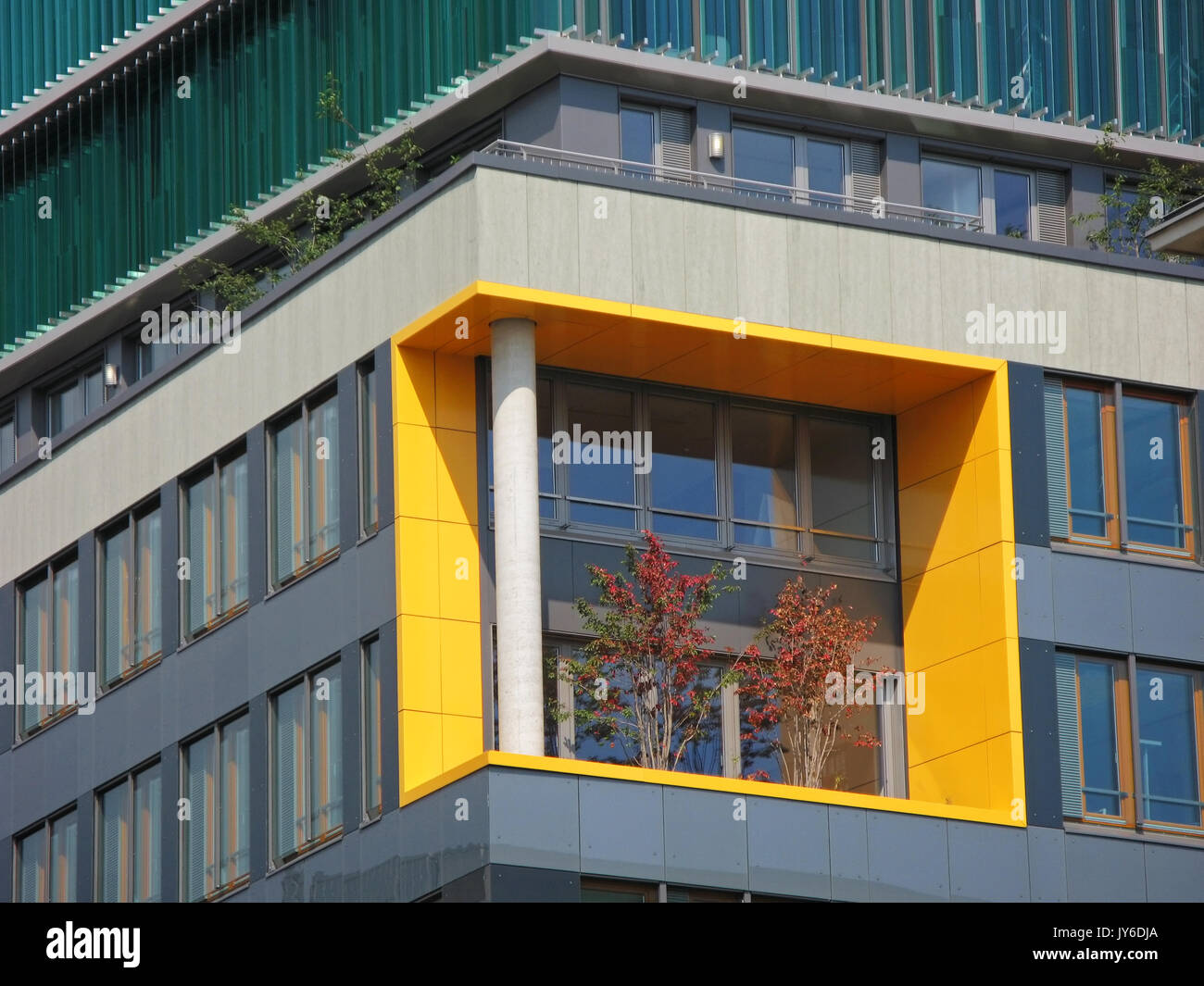 Yellow design building Stock Photo - Alamy