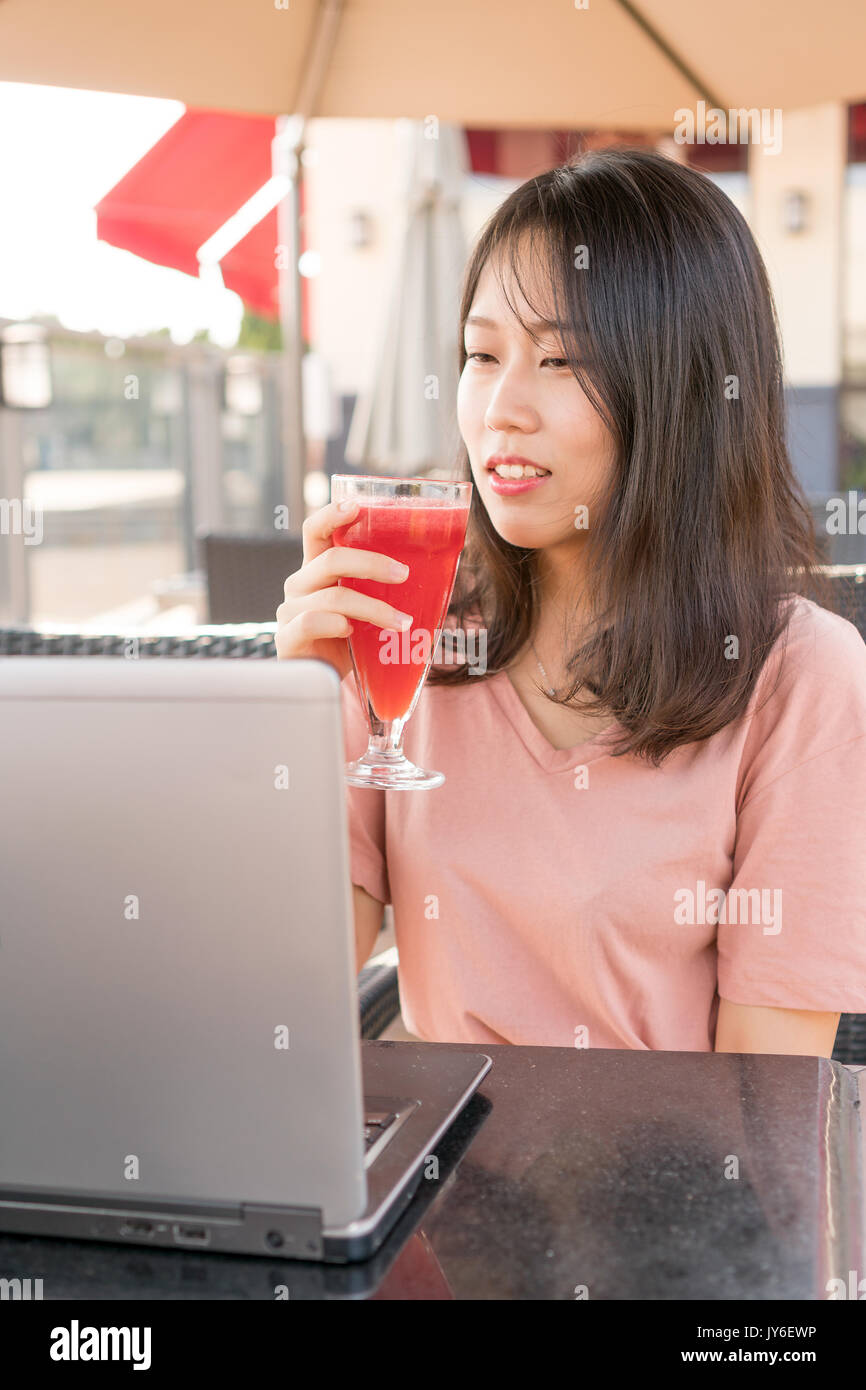 girl watching laptop Stock Photo - Alamy