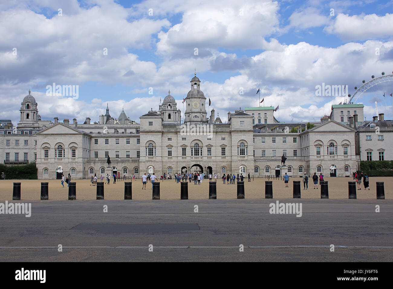 London, Horse Guards Parade building,tourists,London Eye,blue sky with ...