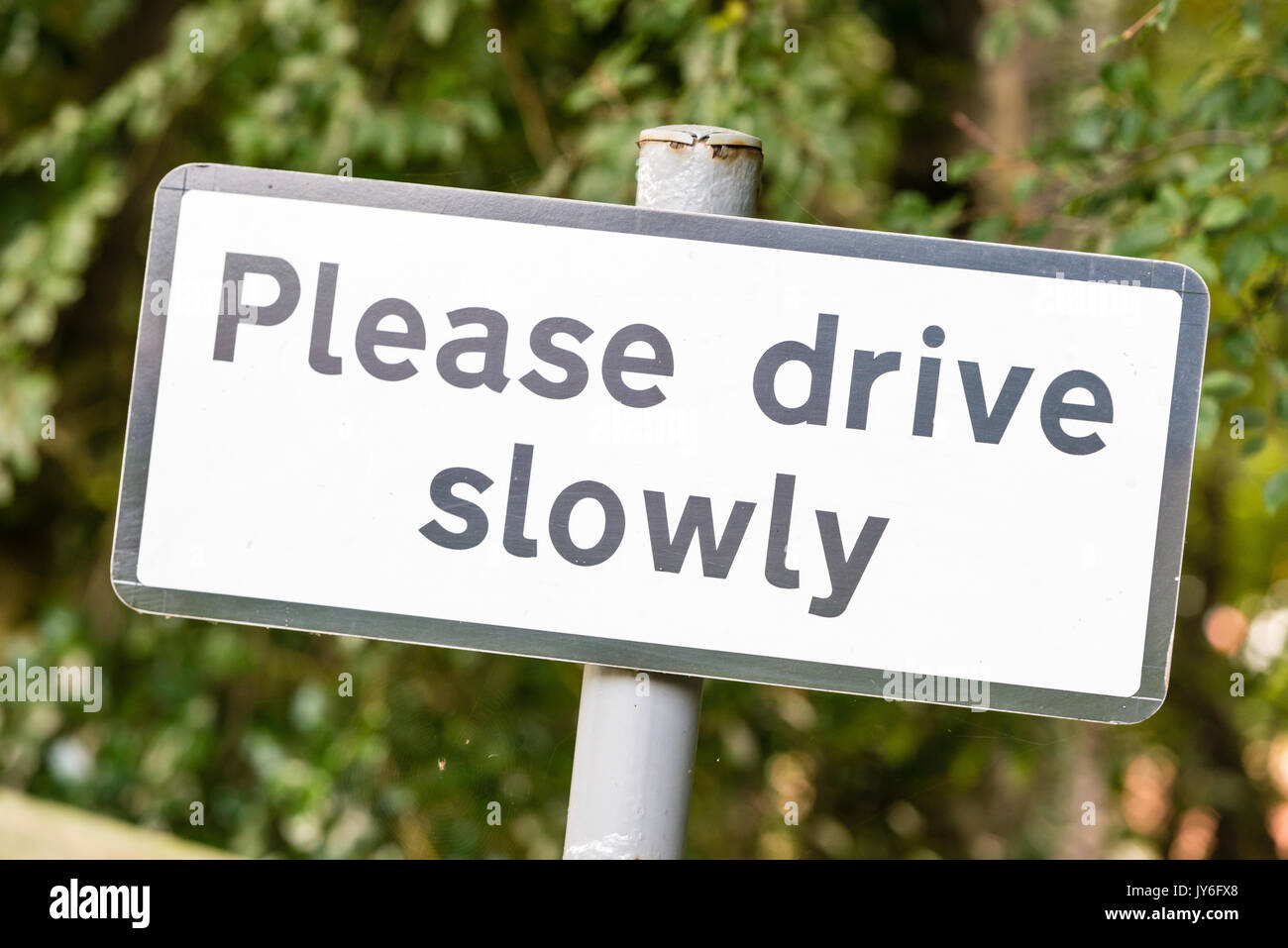 Please Drive Slowly Sign Stock Photos & Please Drive Slowly Sign Stock ...