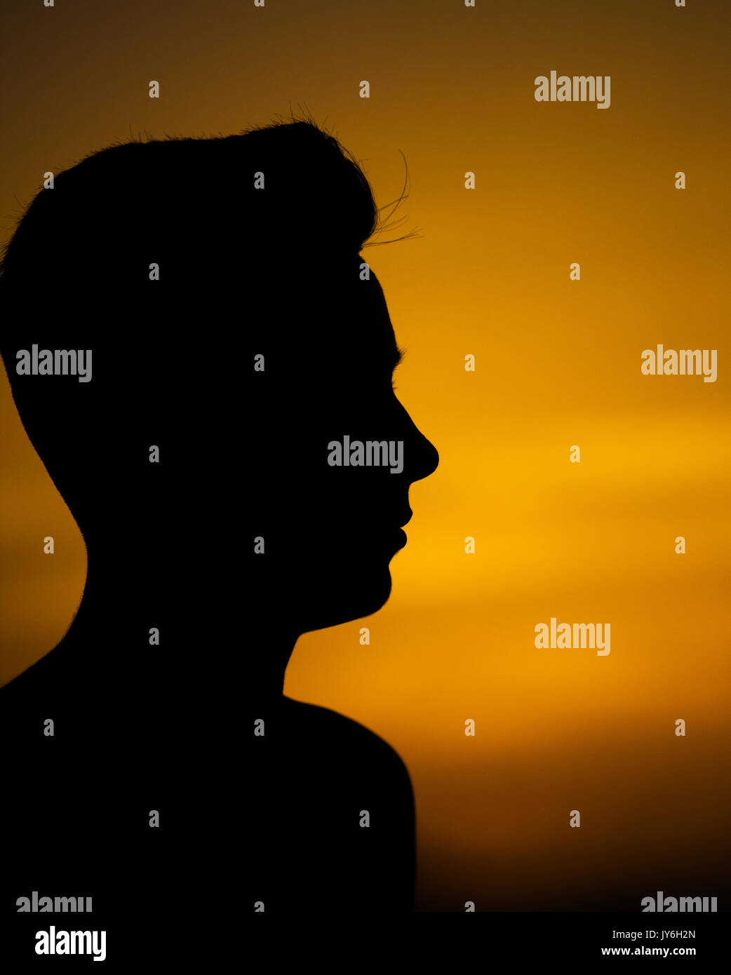 Cute boy throwing a hat Stock Photo - Alamy