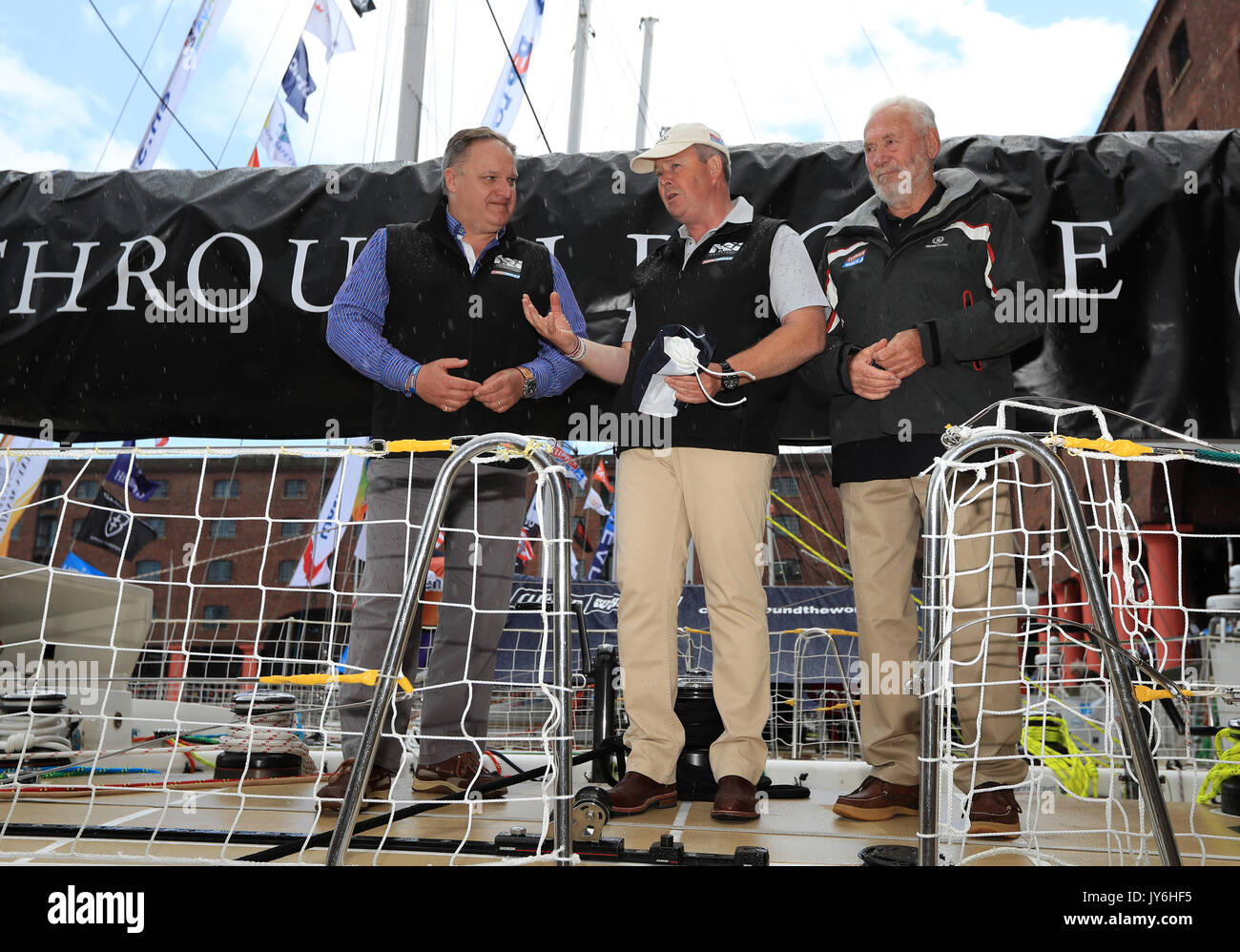 Andrew Greening speaks alongside Sir Robin Knox-Johnston with boat ...
