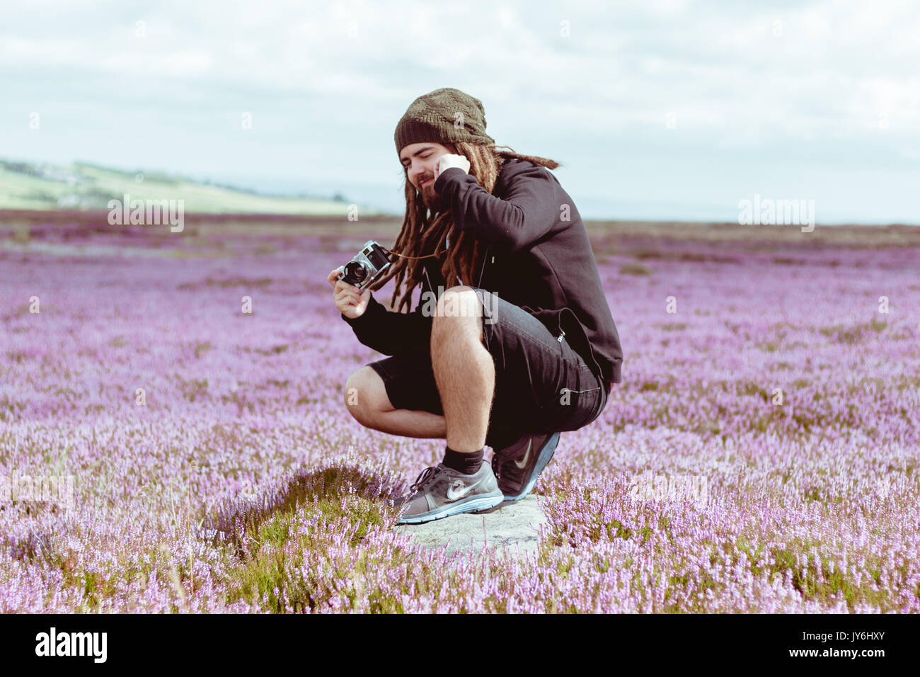 Bearded Photographer With Dreadlocks Takes Photograph With Vintage ...