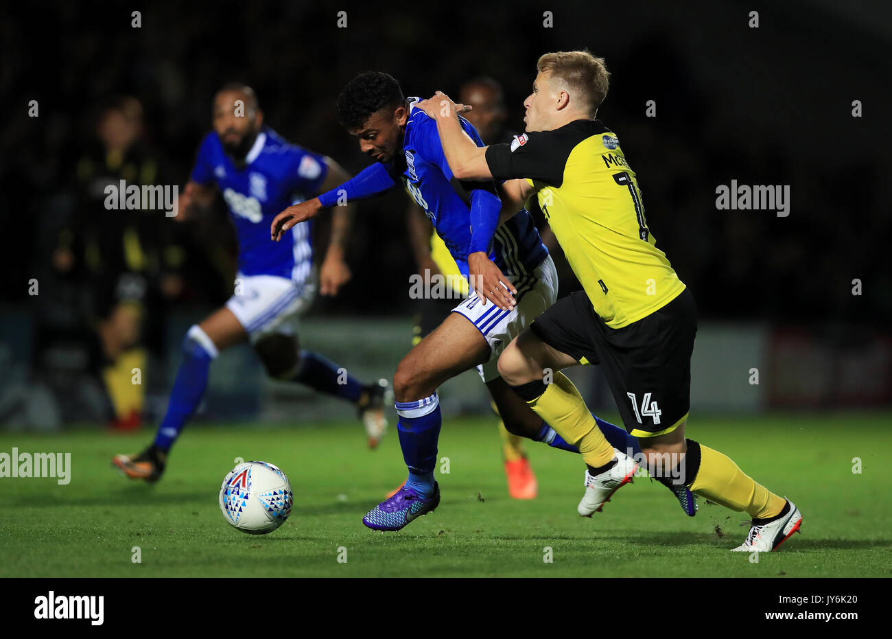 Birmingham City's Isaac Vassell (left) and Burton Albion's Damien ...