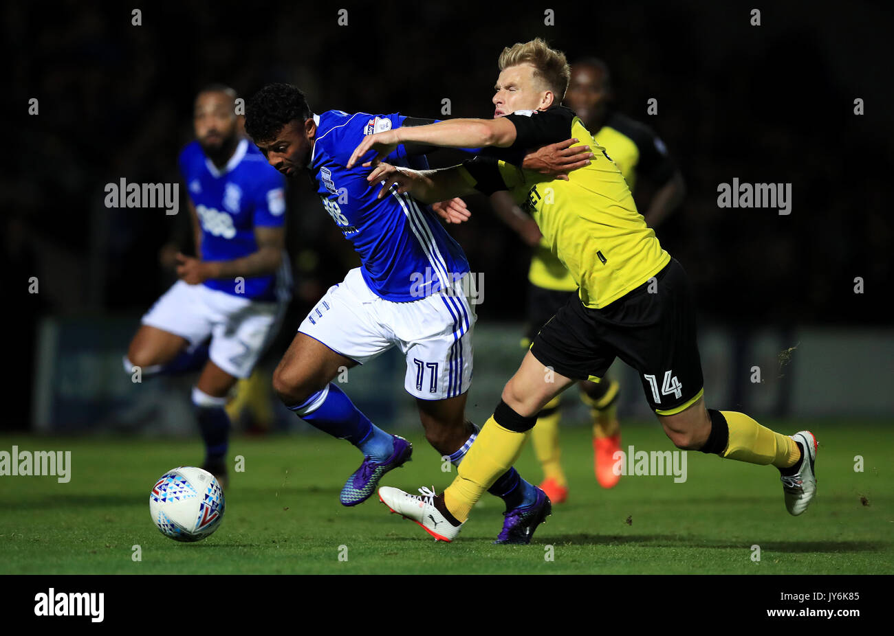 Birmingham City's Isaac Vassell (left) and Burton Albion's Damien ...