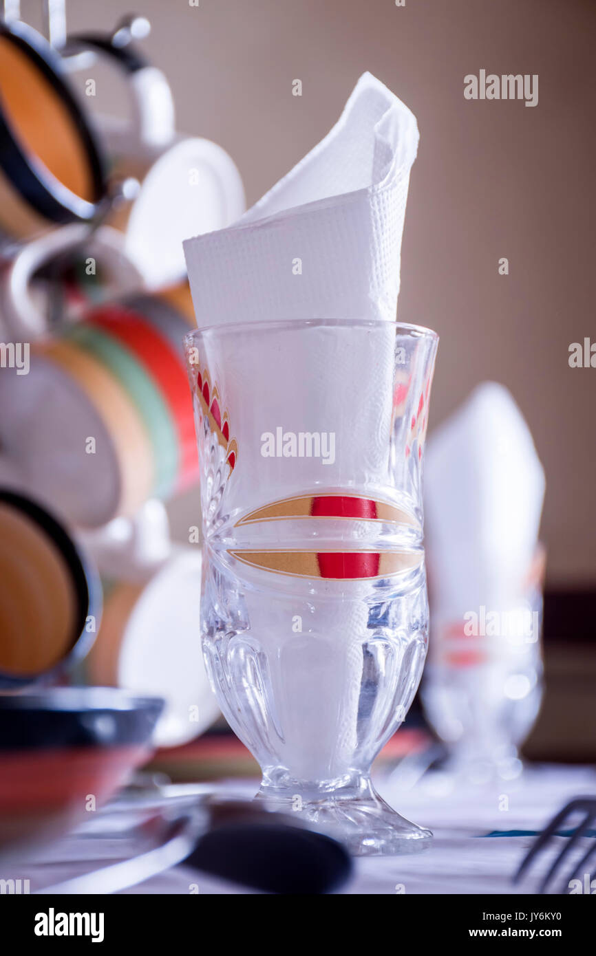 Pretty glass of juice on the dining table Stock Photo - Alamy
