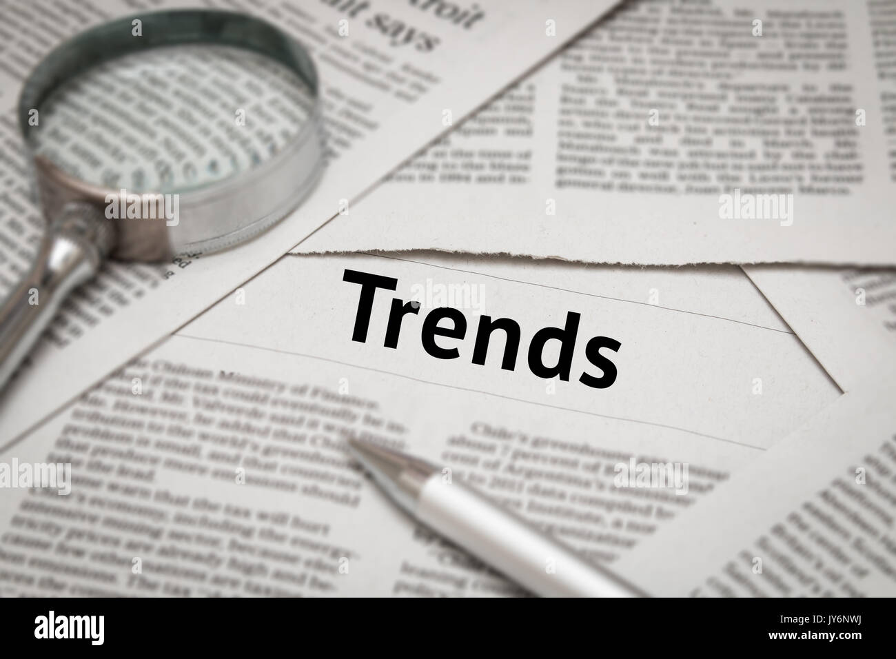 trends headline on newspaper background Stock Photo - Alamy