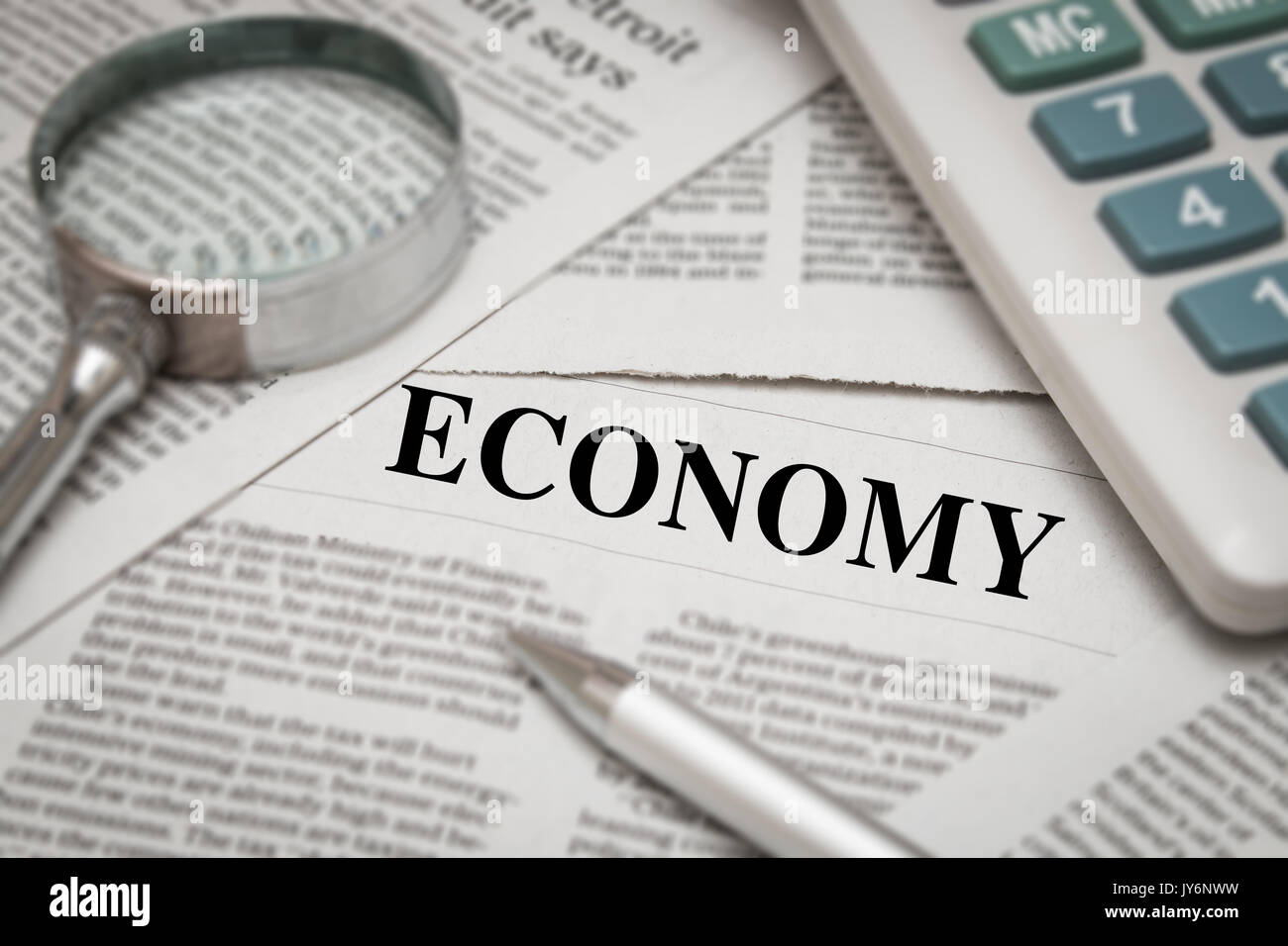 economy headline on newspaper Stock Photo - Alamy
