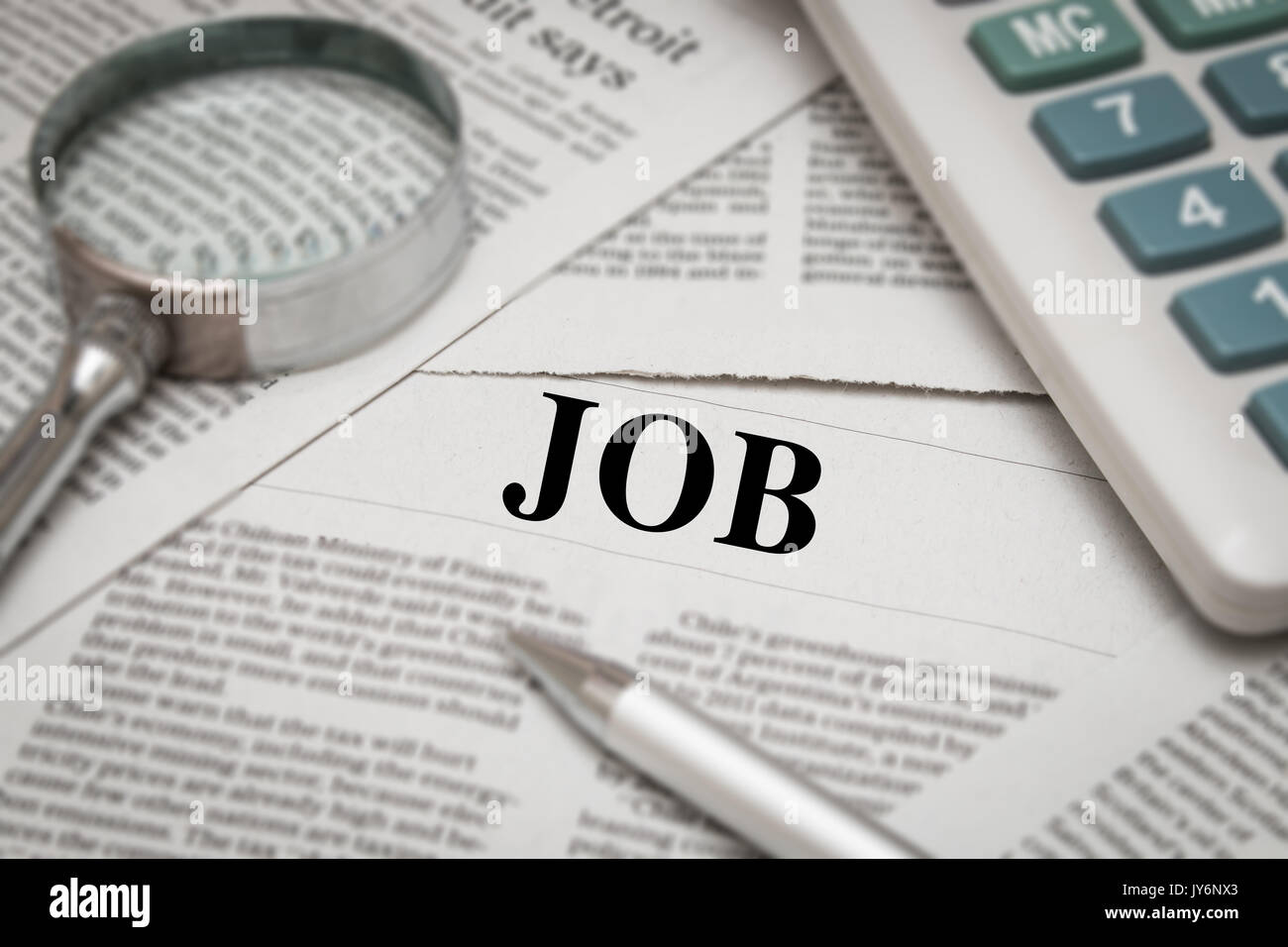 job headline on newspaper Stock Photo - Alamy