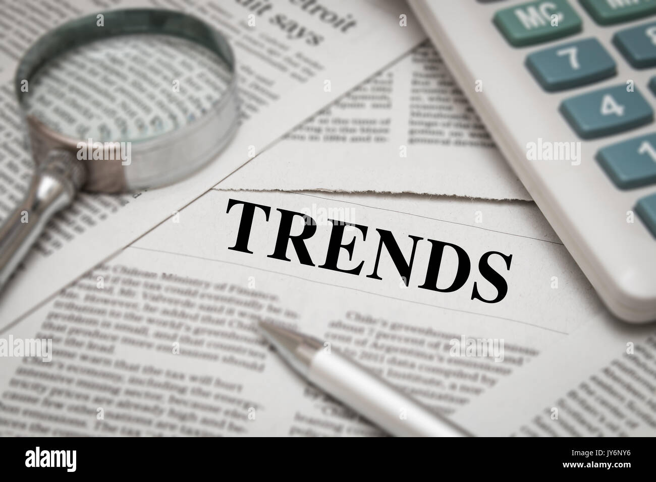 trends headline on newspaper background Stock Photo - Alamy