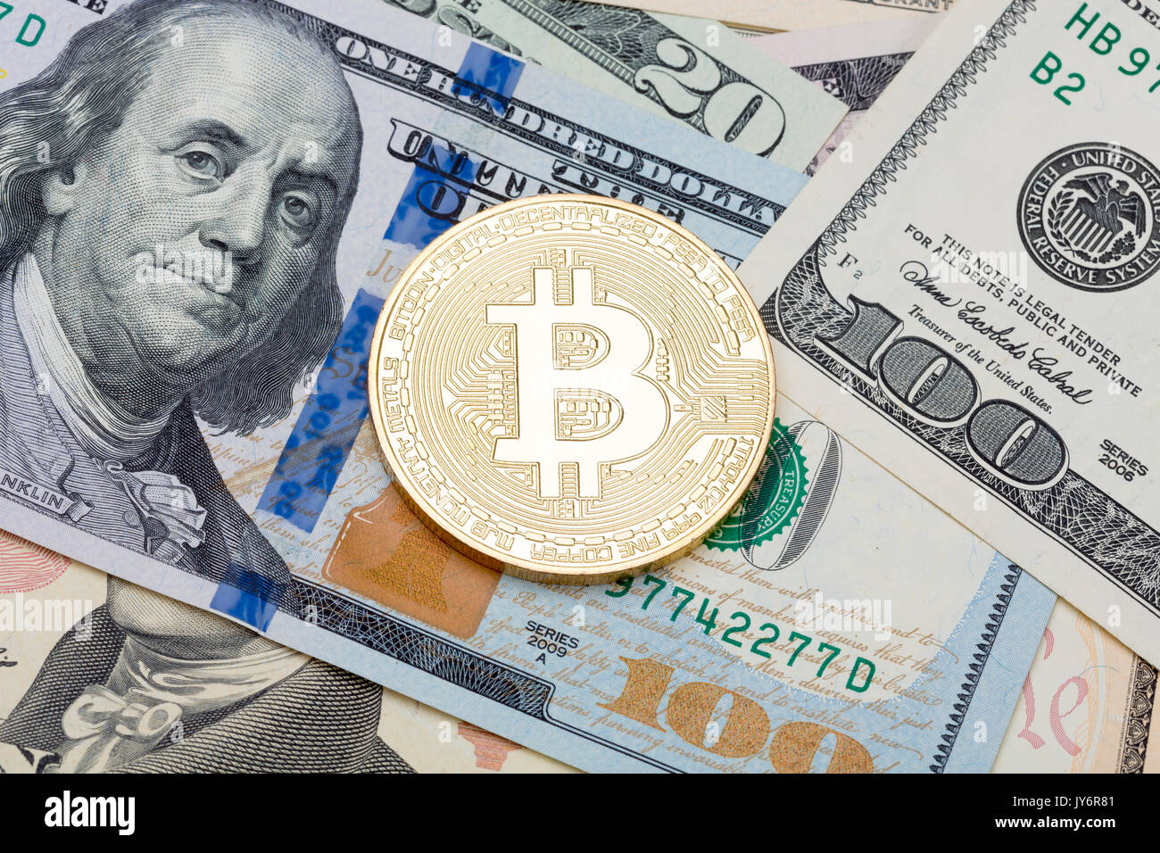US currency covered with golden bitcoin. High resolution photo Stock ...