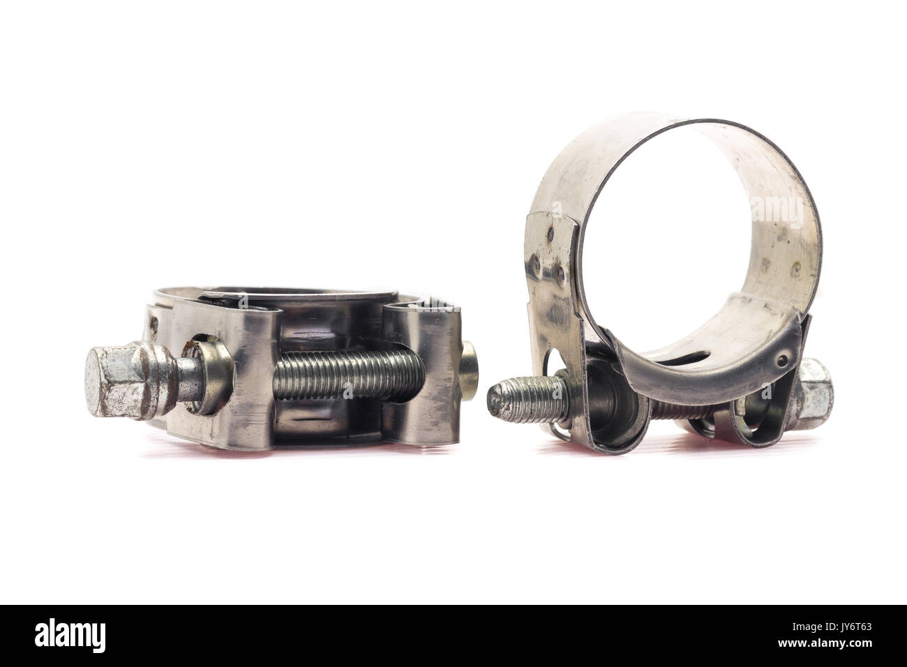 Close up a big hose clamp on white background Stock Photo - Alamy