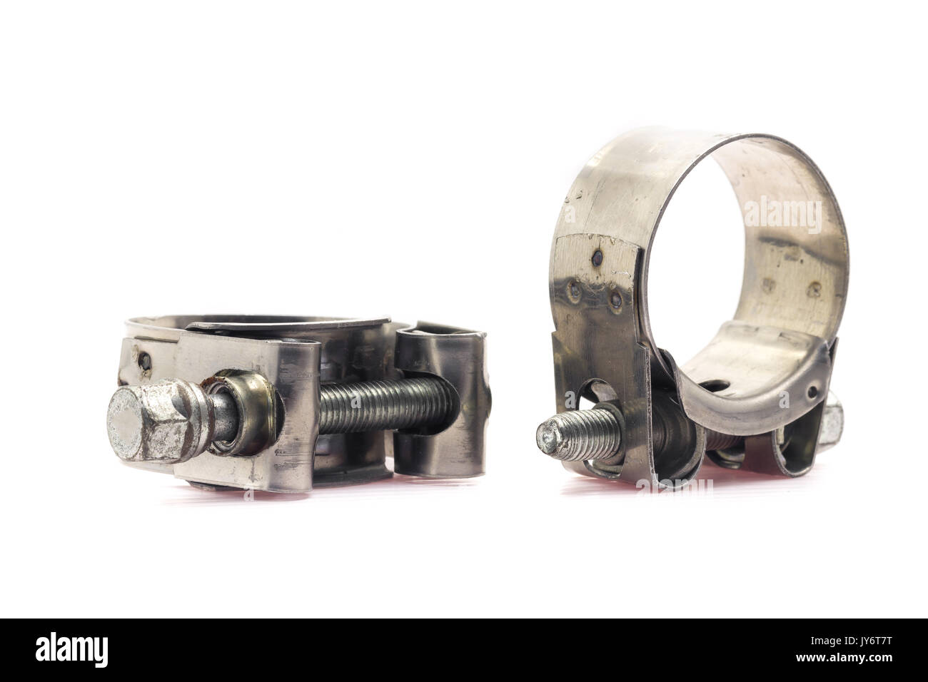 Close up a big hose clamp on white background Stock Photo - Alamy