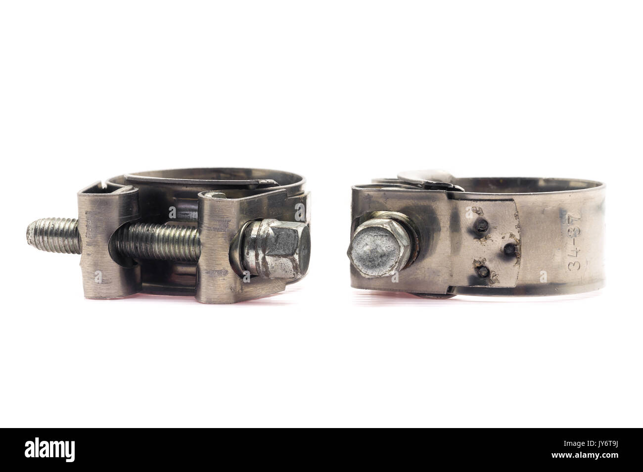 Close up a big hose clamp on white background Stock Photo - Alamy