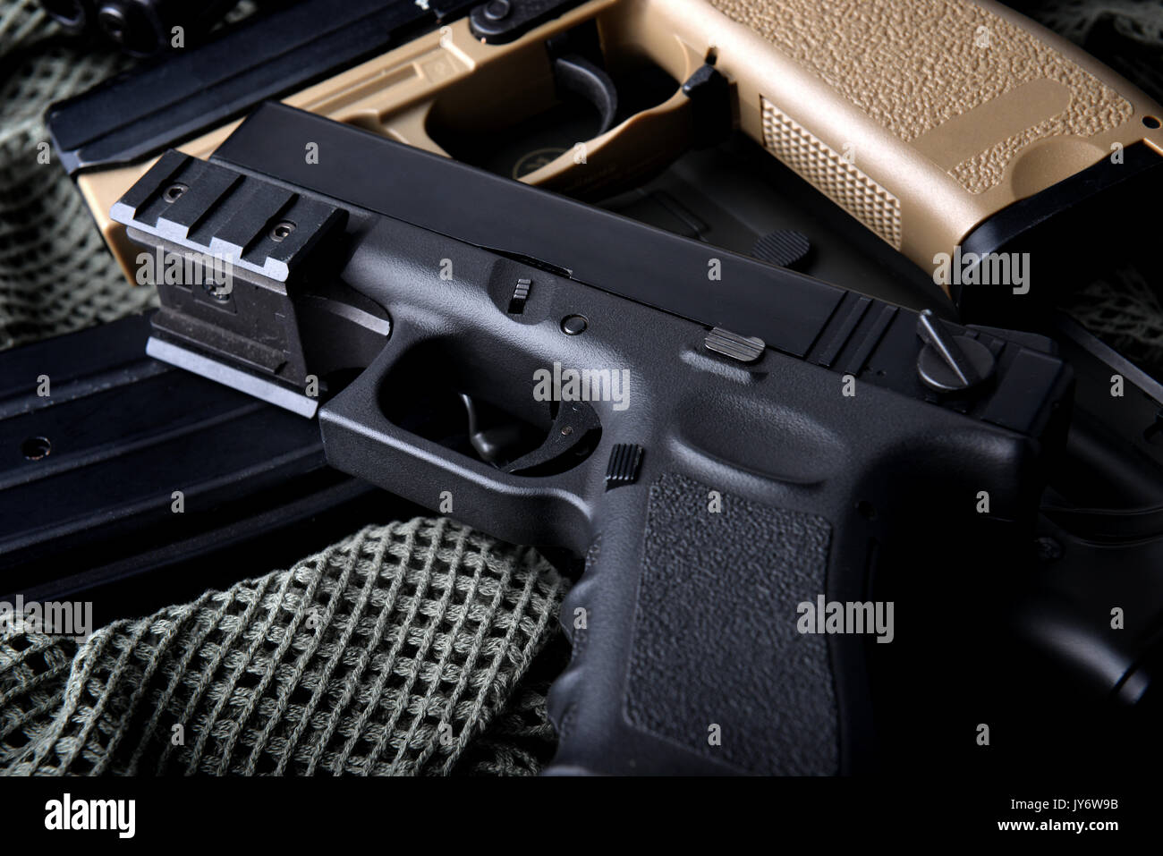 Pistal automatic short hand gun in the US army prop background photo in ...