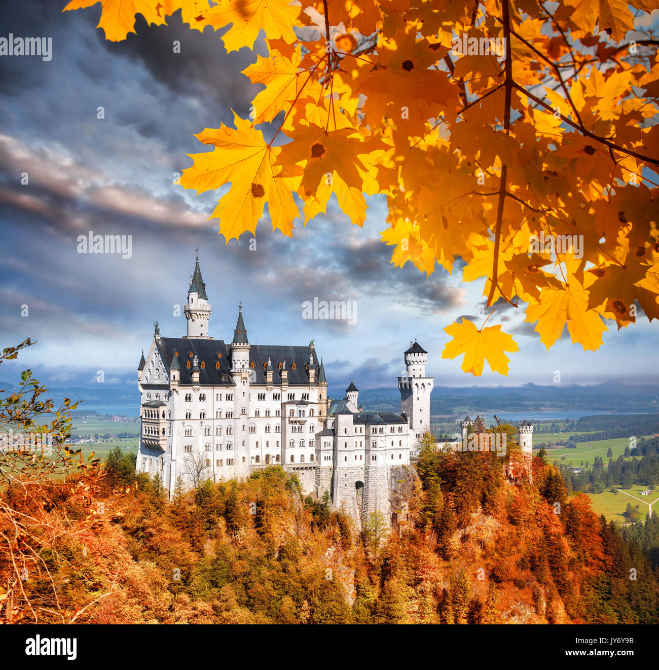 Famous Neuschwanstein castle in Bavaria with autumn leaves, Germany ...