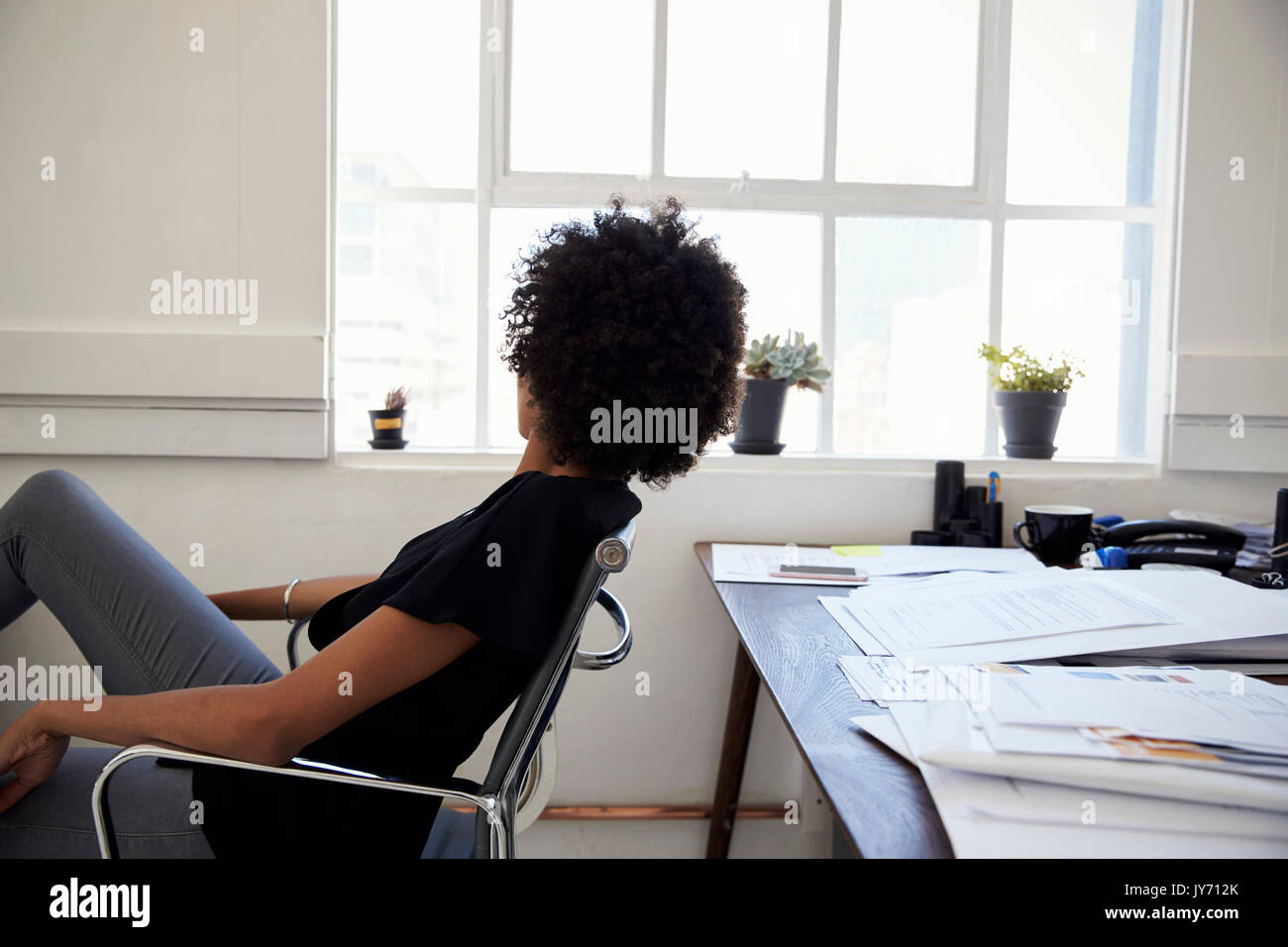 Back view with head turned to side hi-res stock photography and images ...