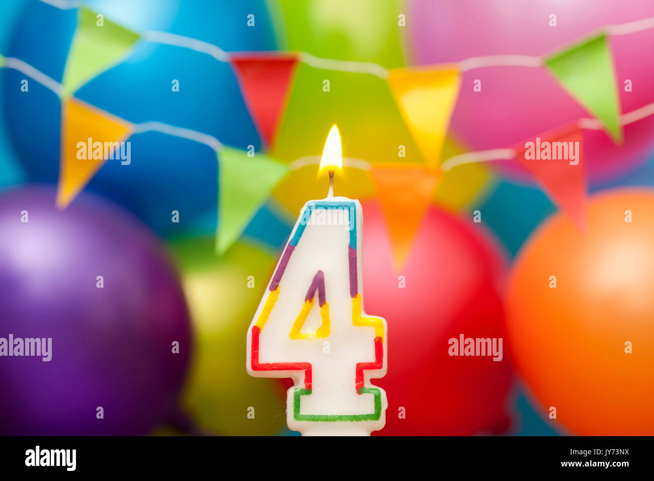 Happy Birthday number 4 celebration candle with colorful balloons and ...