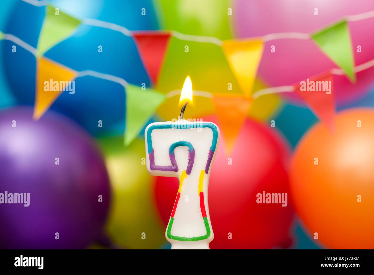 Happy Birthday number 7 celebration candle with colorful balloons and ...