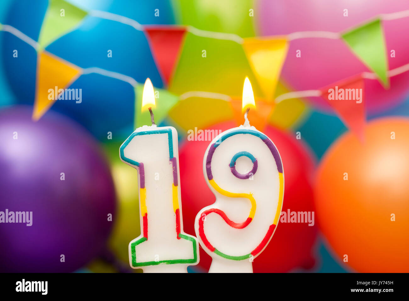 Birthday candle number 19 flame hi-res stock photography and images - Alamy