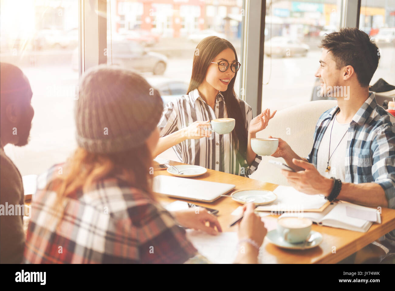 Cheerful students talking in the cafeteria Stock Photo - Alamy