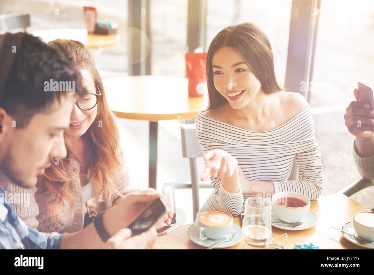 Group students at cafe hi-res stock photography and images - Alamy