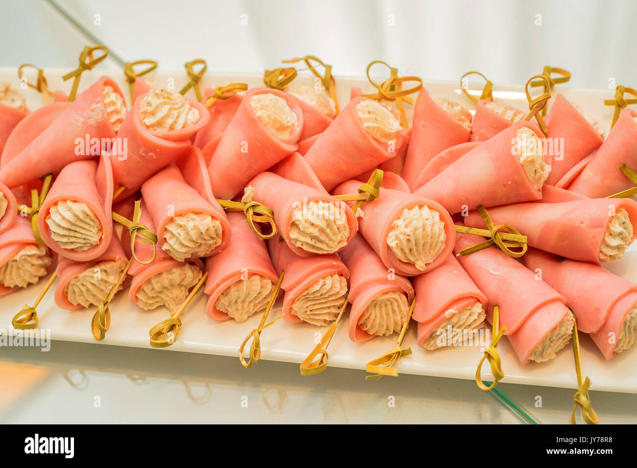 Ham rolls appetizer Stock Photo - Alamy