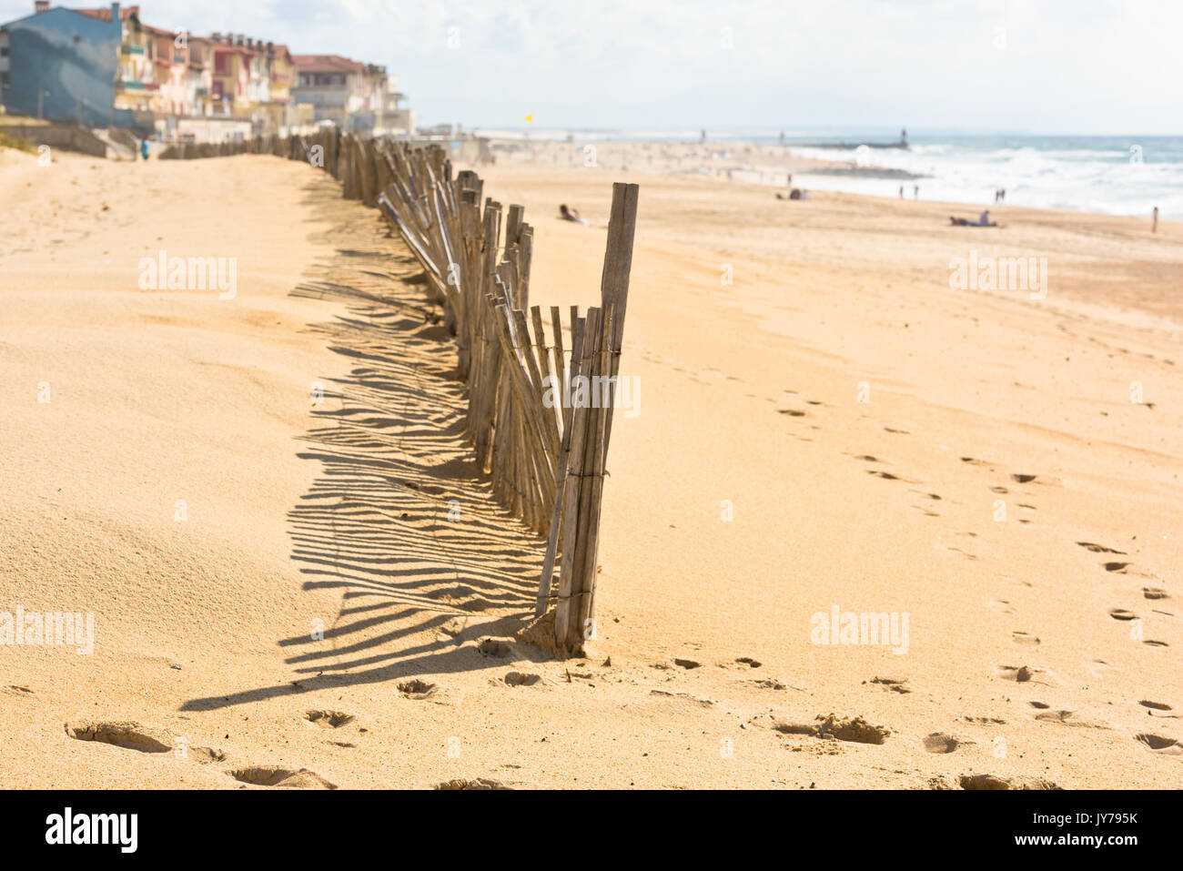 Wooden fence on an Atlantic beach in France, The Gironde Department ...