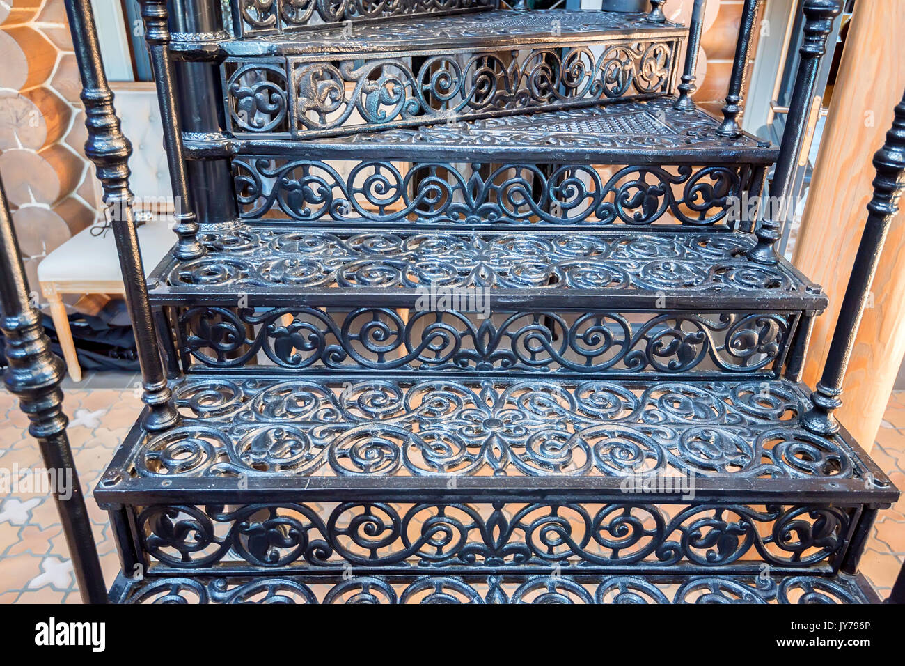 Black forged iron staircase close up Stock Photo - Alamy