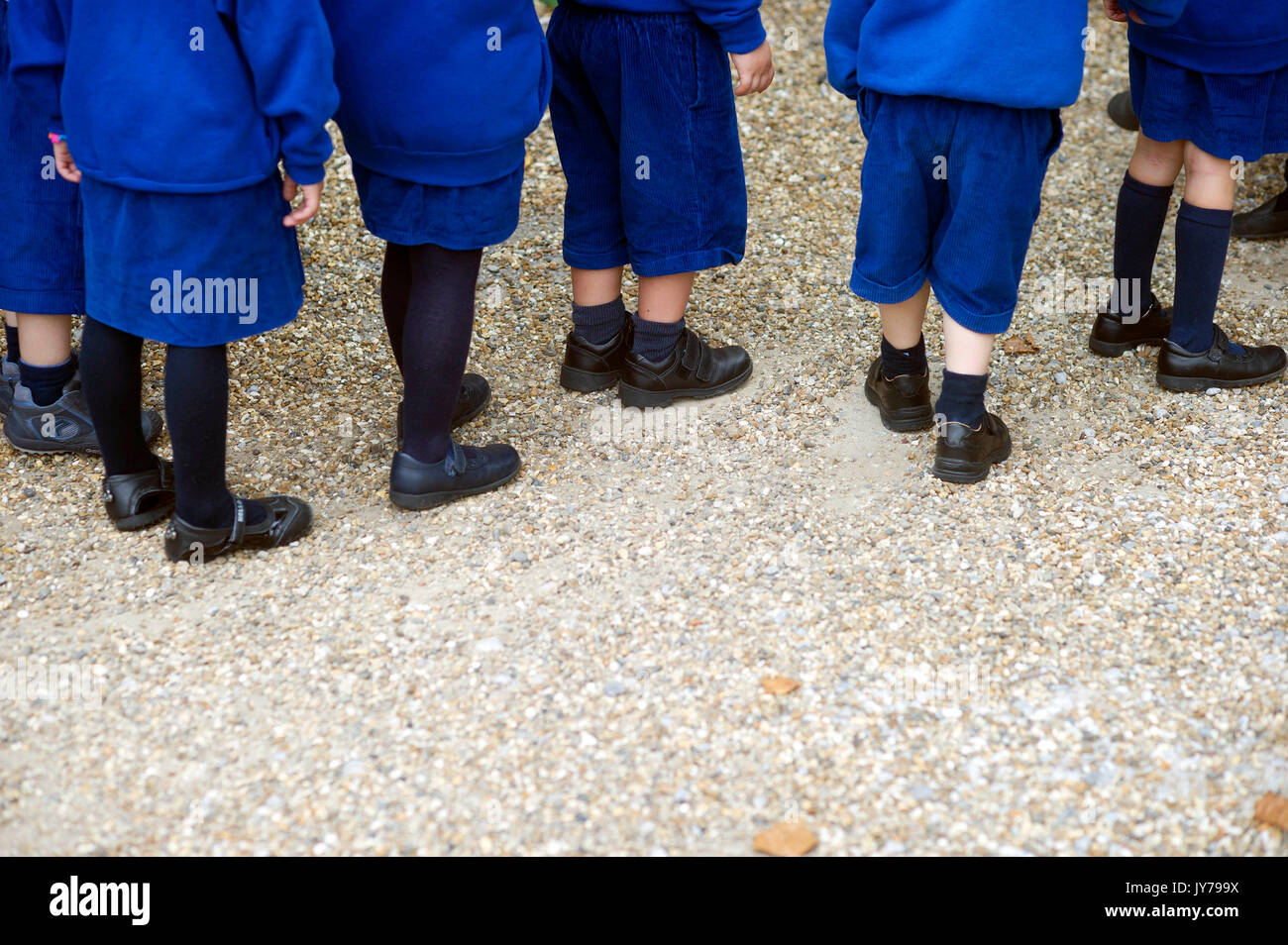 Happy young private school children lining up in school yard Stock ... Happy young private school children lining up in school yard Stock ...