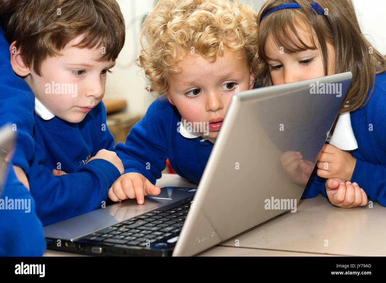 infant school children using a laptop computer Stock Photo - Alamy