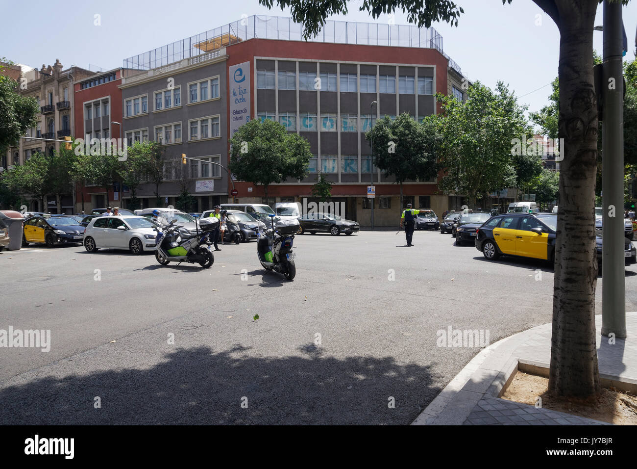 Police men of Guardia Urbana securing road safety on Barcelona city ...