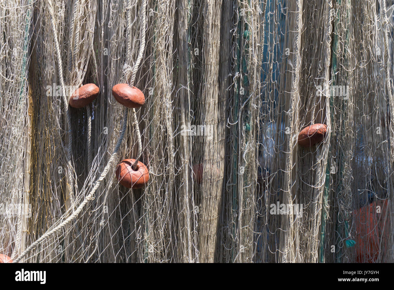 Fishing net background Stock Photo - Alamy