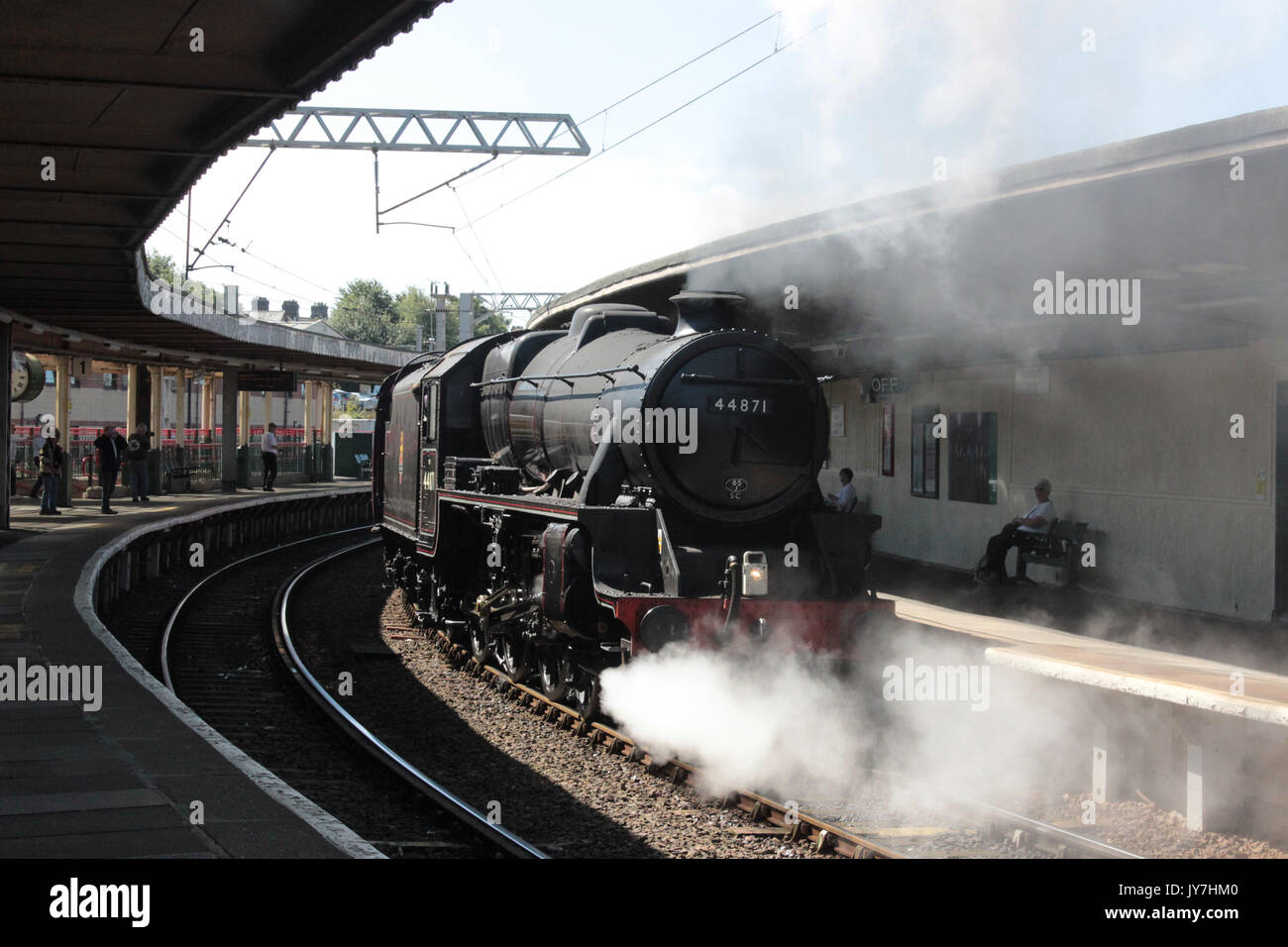 Black Five steam locomotive 44871 passing through Carnforth railway ...