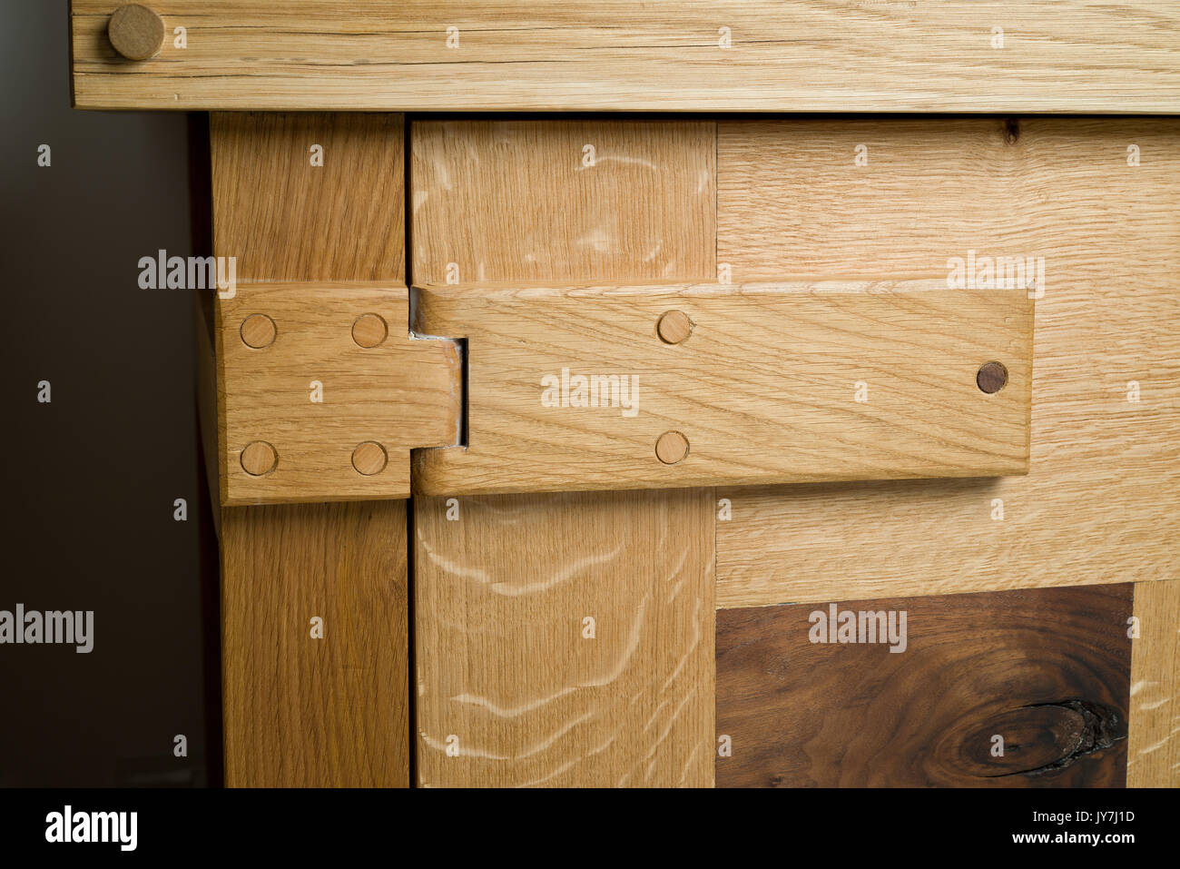Wood hinge on oak cupboard Stock Photo - Alamy